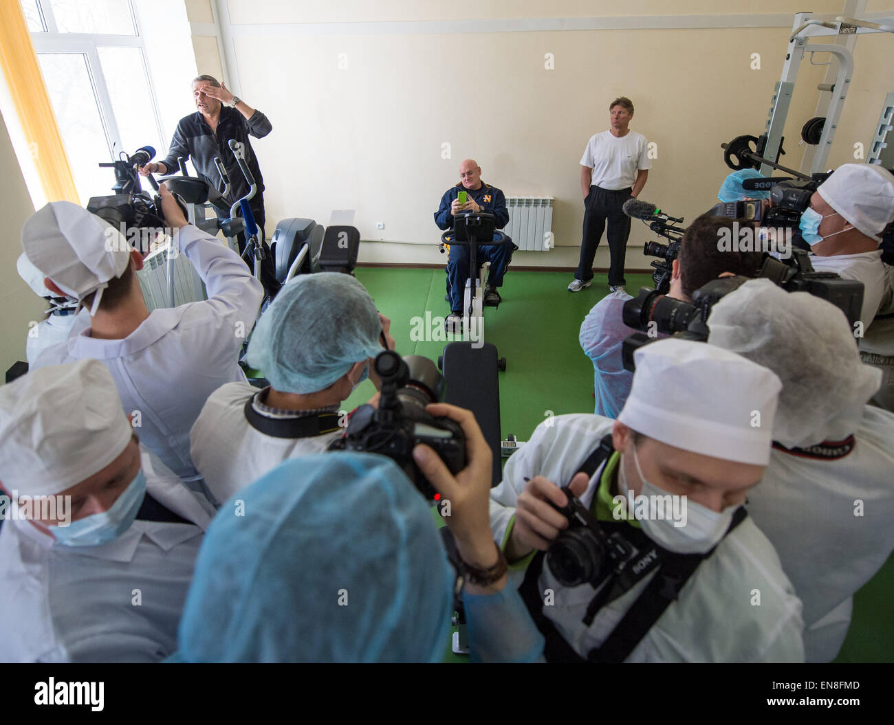 NASA astronaut Scott Kelly and Russian cosmonauts Mikhail Kornienko and ...