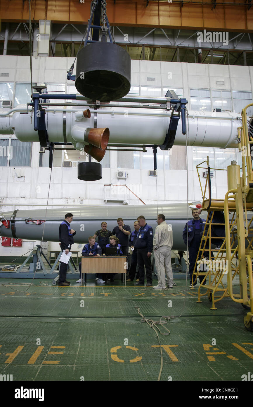 The Soyuz rocket and TMA-16M spacecraft are assembled at the Baikonur ...