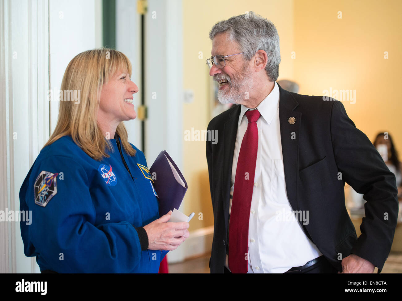 Astronaut Kay Hire engages with John Holdren at an event celebrating ...