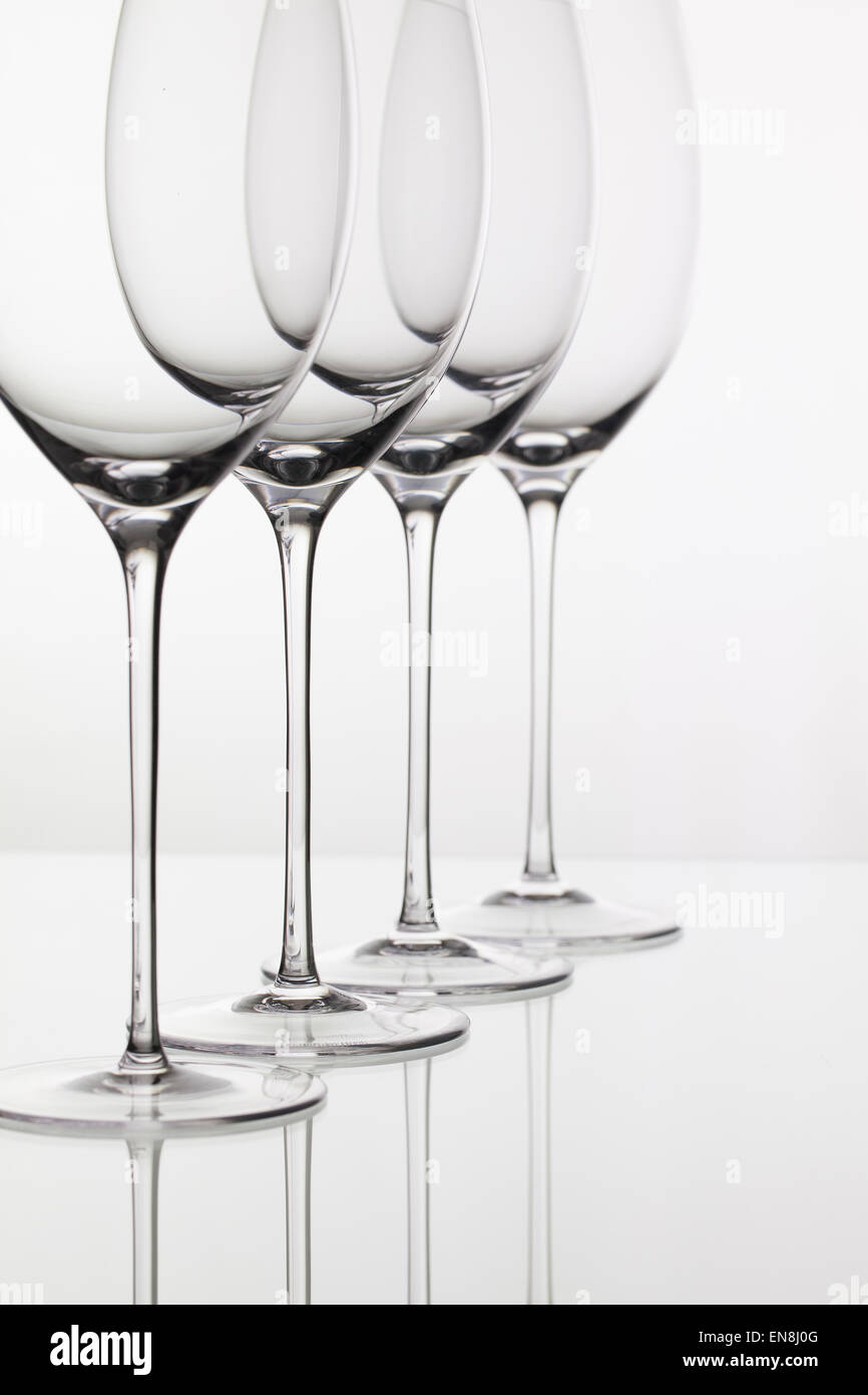 Five glasses of wine and on the white background Stock Photo - Alamy