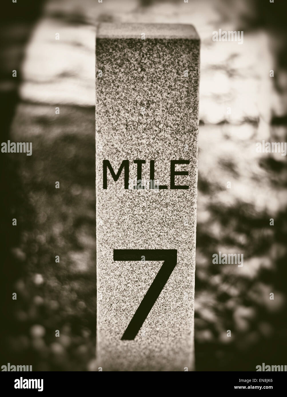 A granite roadside mile marker Stock Photo - Alamy