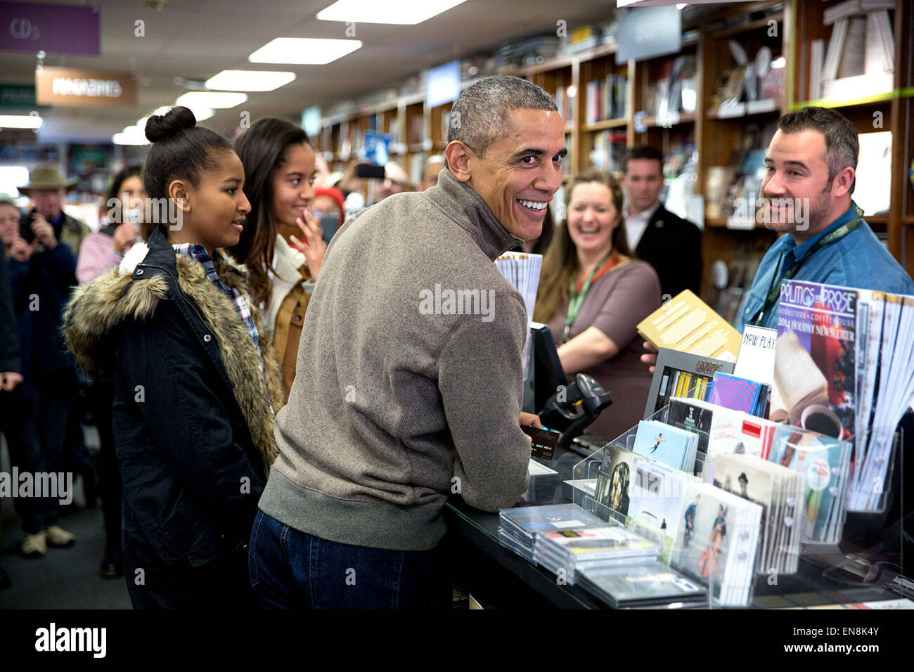 President Barack Obama and daughters Sasha and Malia shop for books at ...