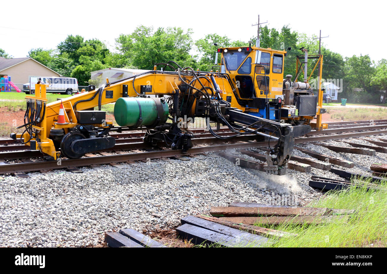 A method of repairing a damaged railroad rail comprising the steps of ...