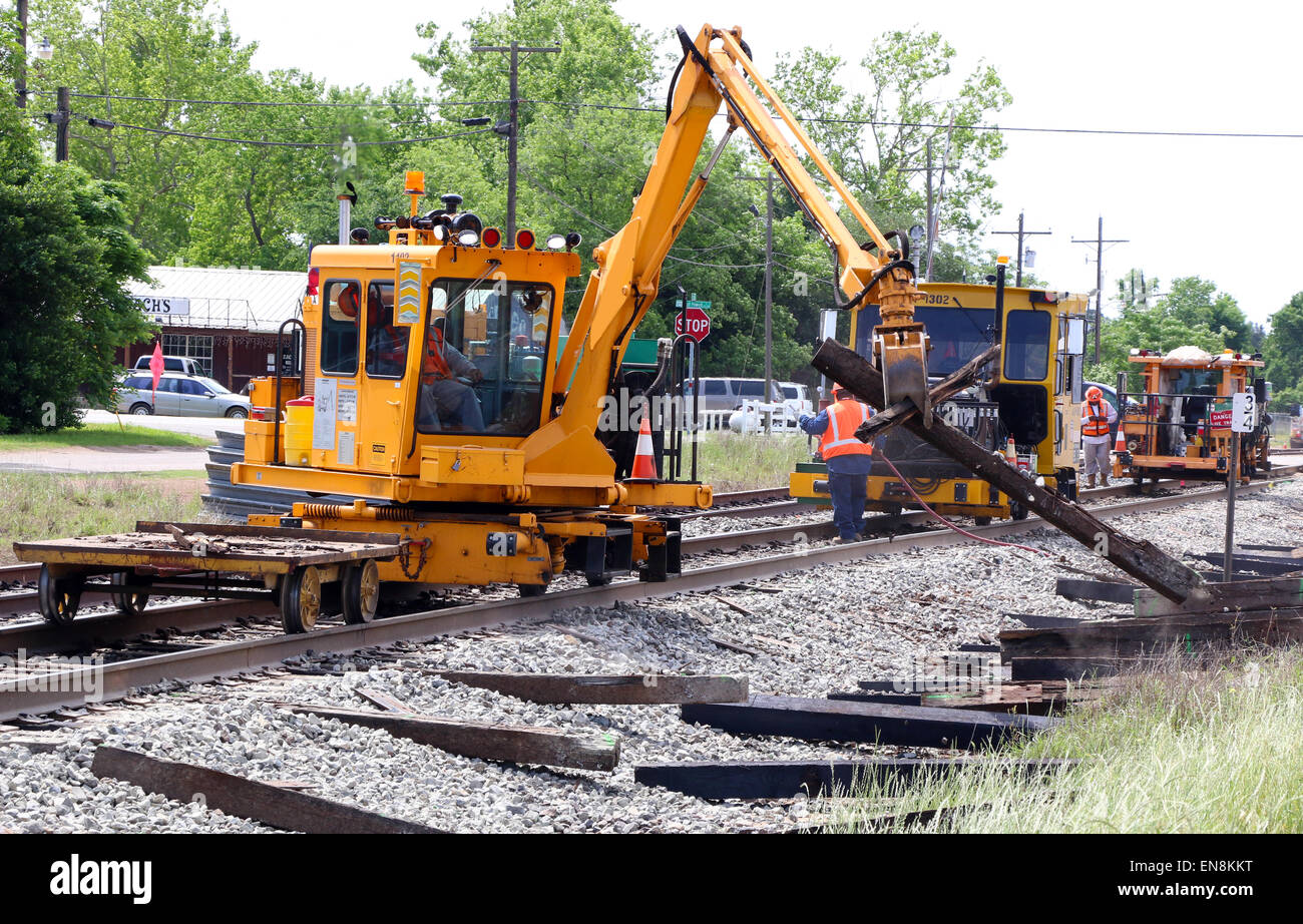 A method of repairing a damaged railroad rail comprising the steps of ...