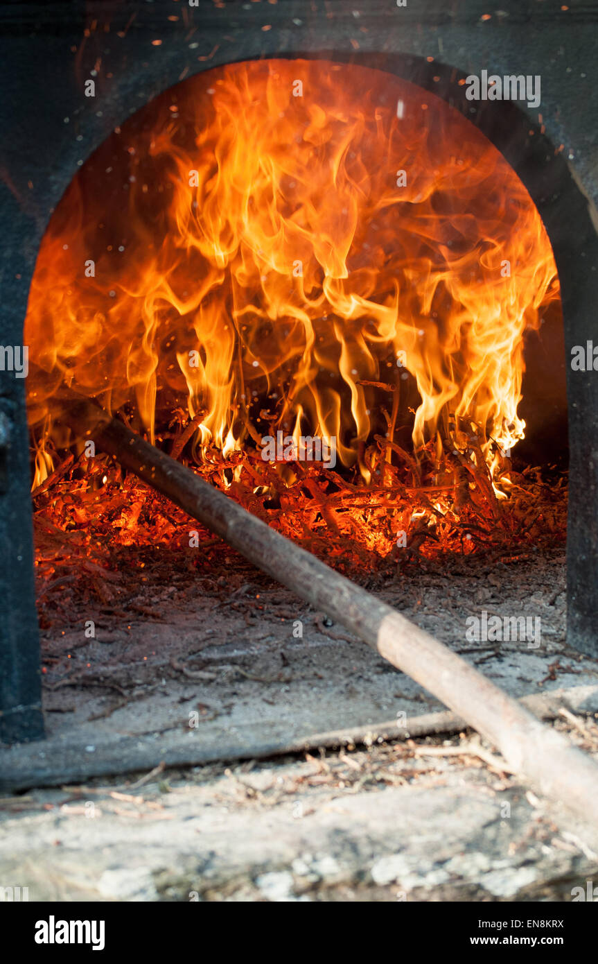 Flames in a raging fire inside a traditional wood fired oven Stock ...
