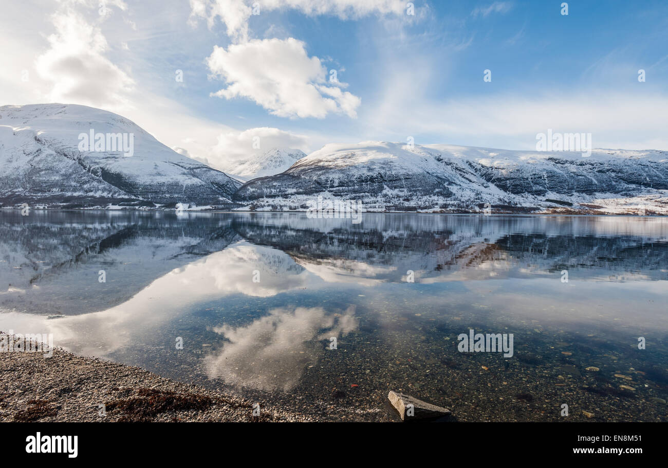 Mountains reflecting on water, Lyngen Alps, arctic Norway Stock Photo ...