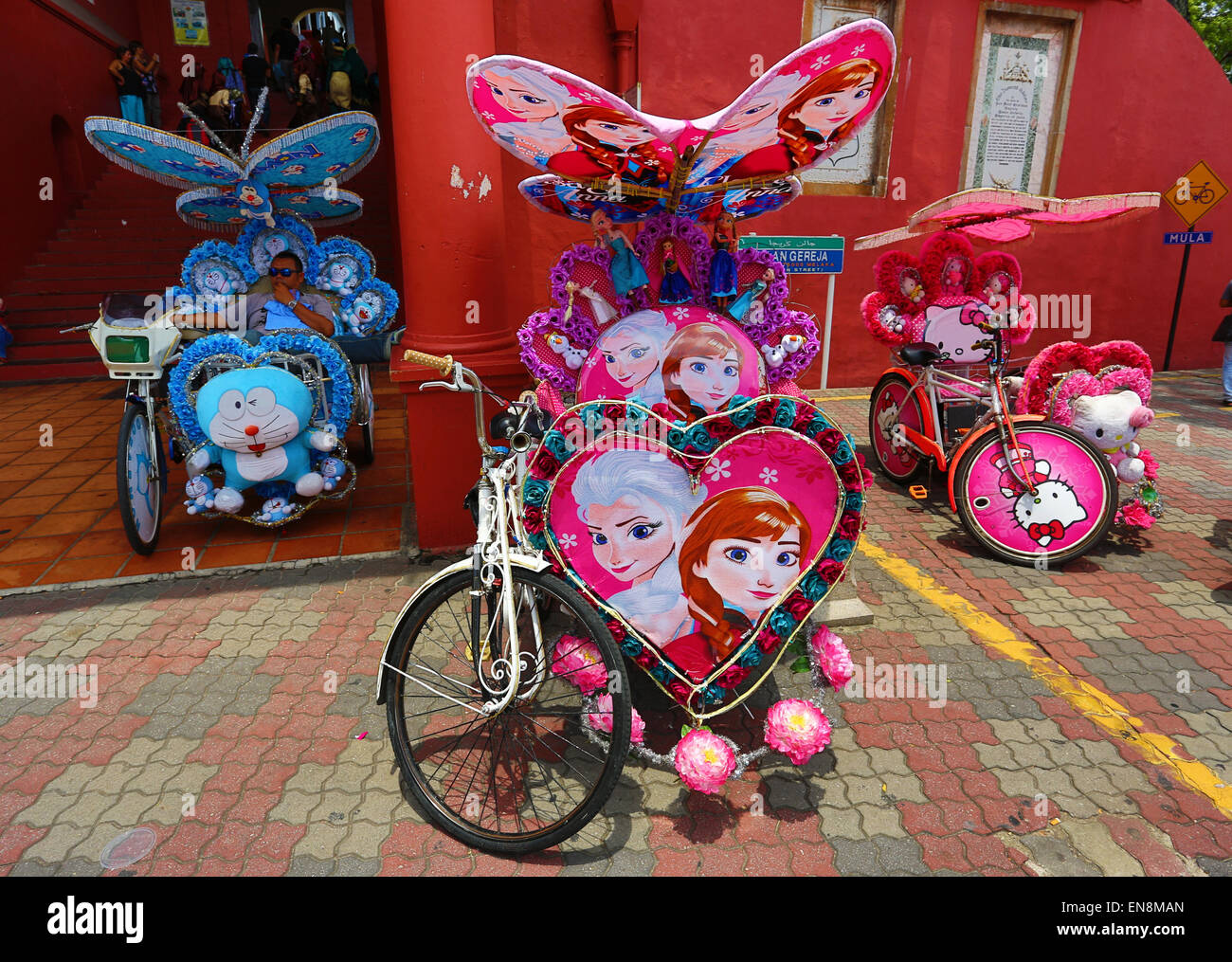 Decorated kitsch cycle trishaw rickshaw with soft toys in Malacca ...