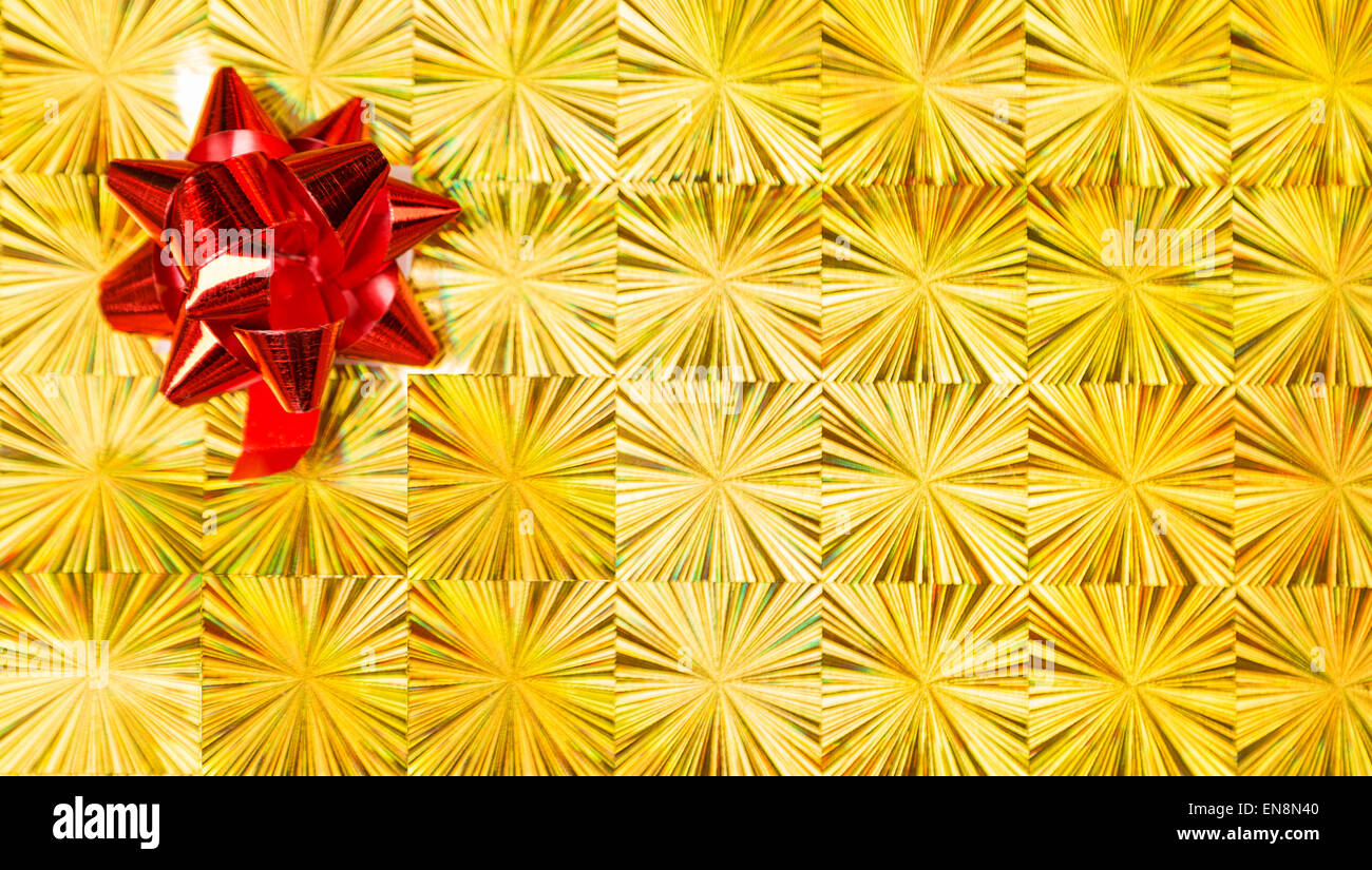 red bow on golden abstract background Stock Photo - Alamy
