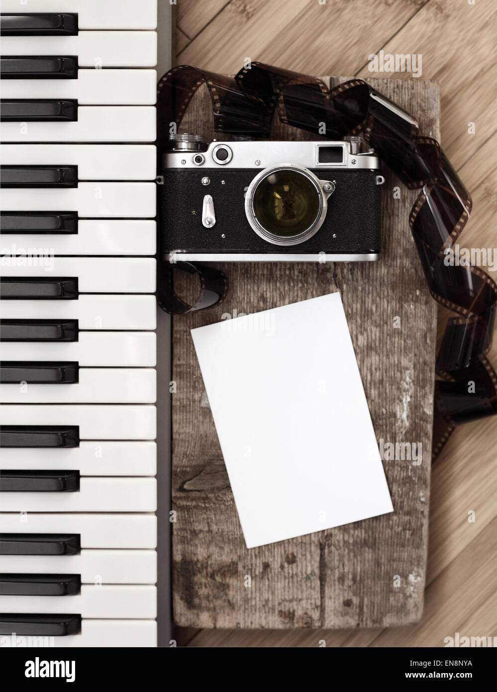 Artwork in retro style, old camera, film, piano Stock Photo - Alamy