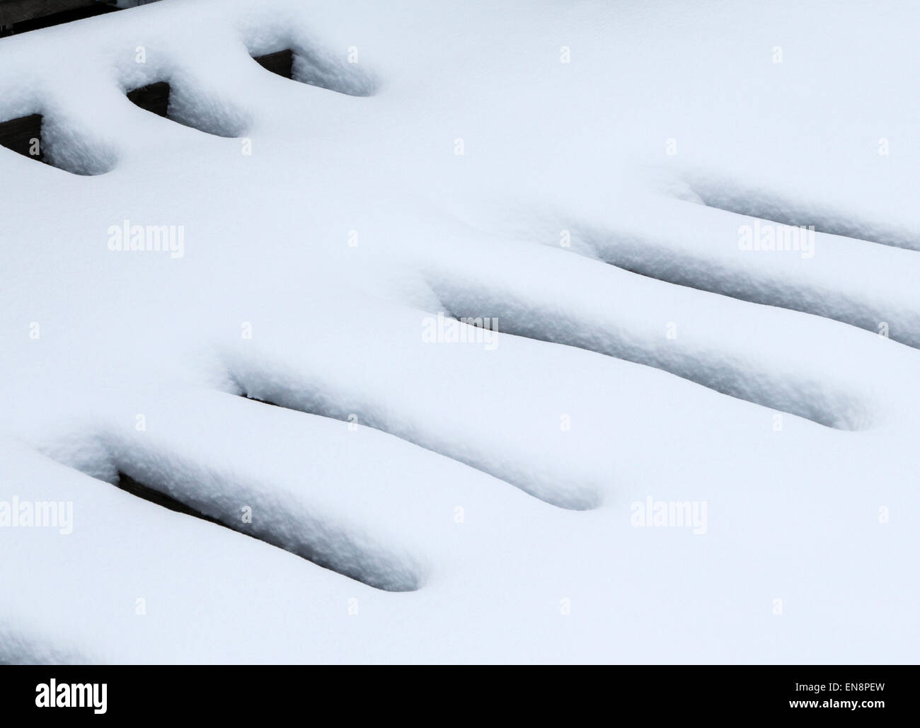 Snow creates patterns on old rail structure Stock Photo - Alamy