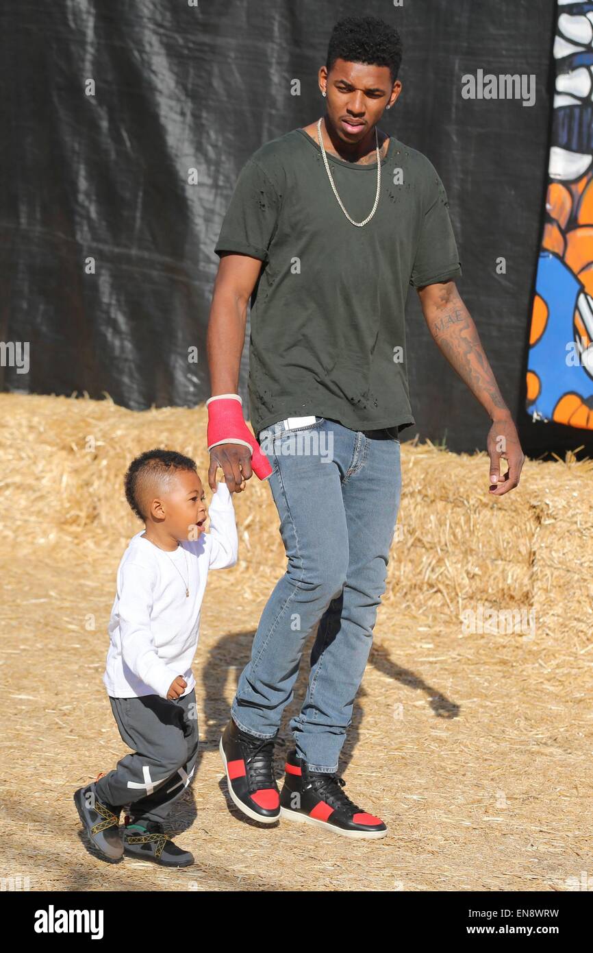 Nick Young visits Mr. Bones Pumpkin Patch with his son Featuring: Nick ...