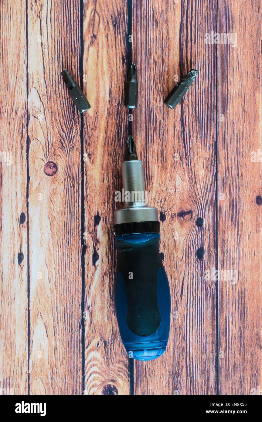 Screwdriver set close up on wood Stock Photo - Alamy