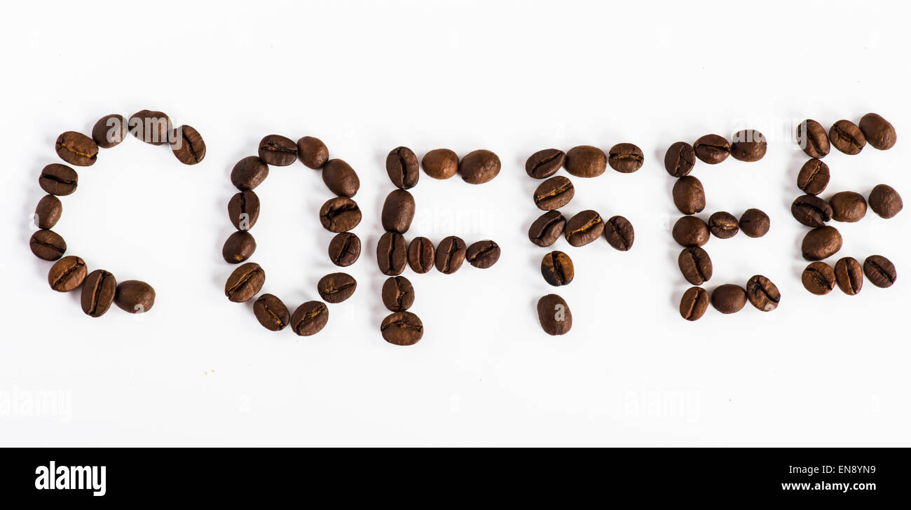 Word coffee made from coffee beans on white Stock Photo - Alamy