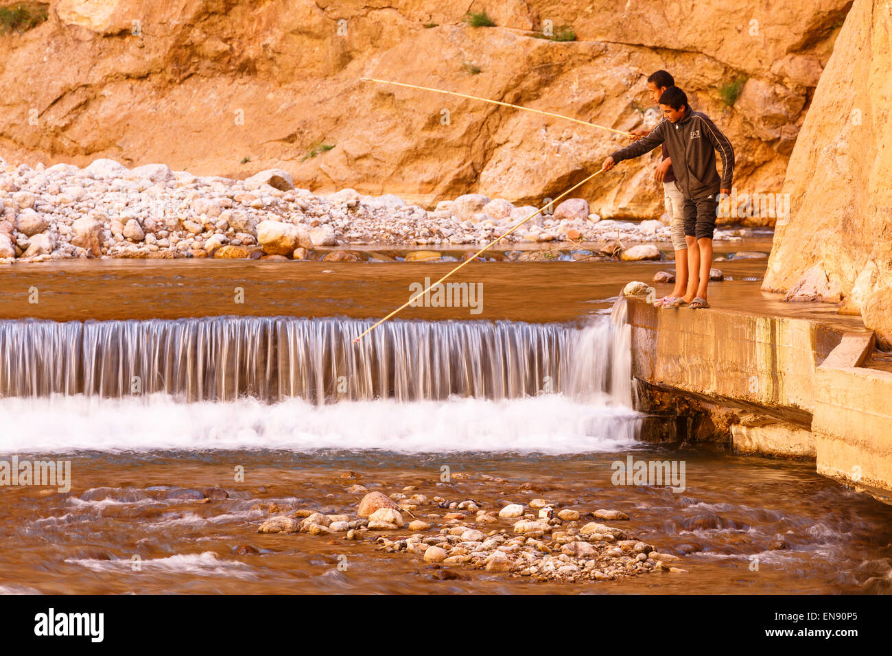 Children fishing. Todra Gorges. Morocco. Africa Stock Photo - Alamy