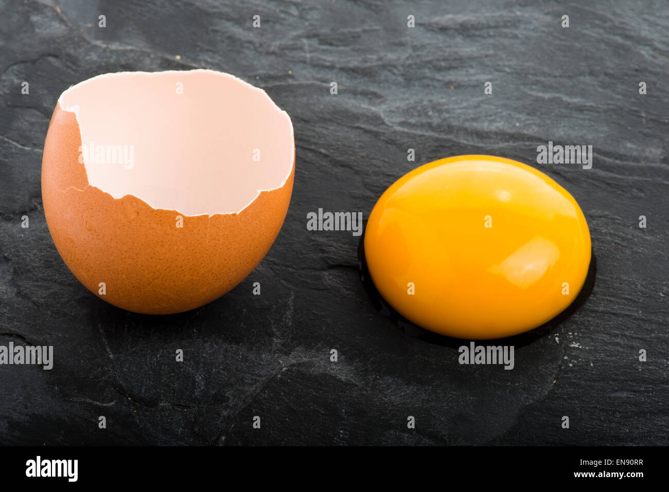 Egg raw shell orange hi-res stock photography and images - Alamy