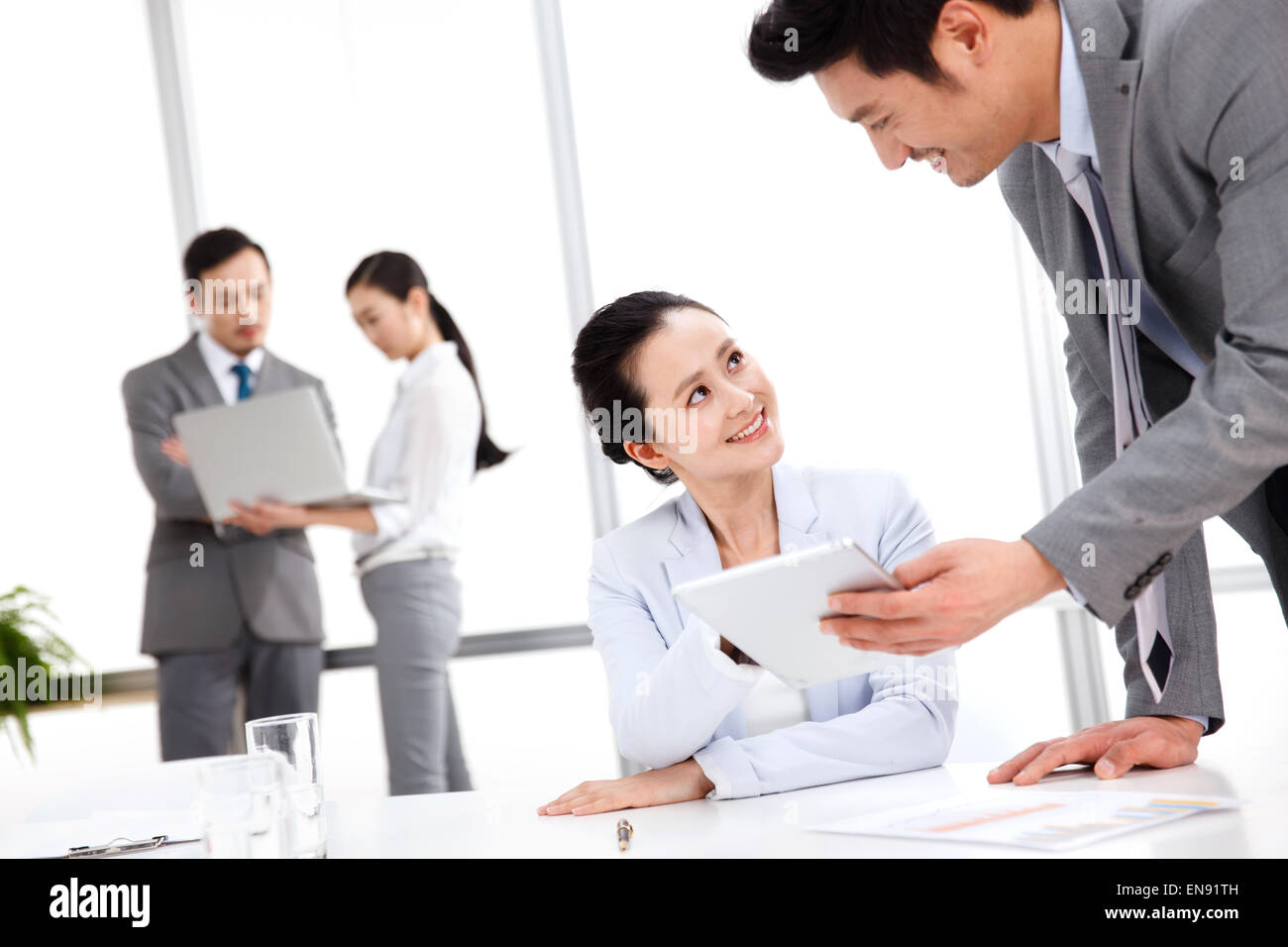 Business men and women working in the Office Stock Photo - Alamy