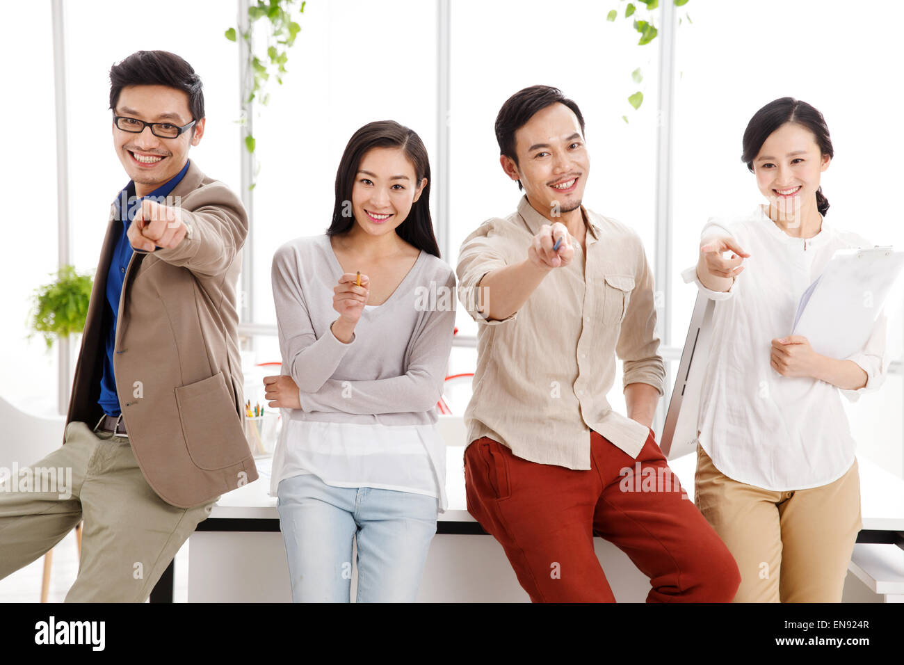 The leisure business men and women in the Office Stock Photo - Alamy