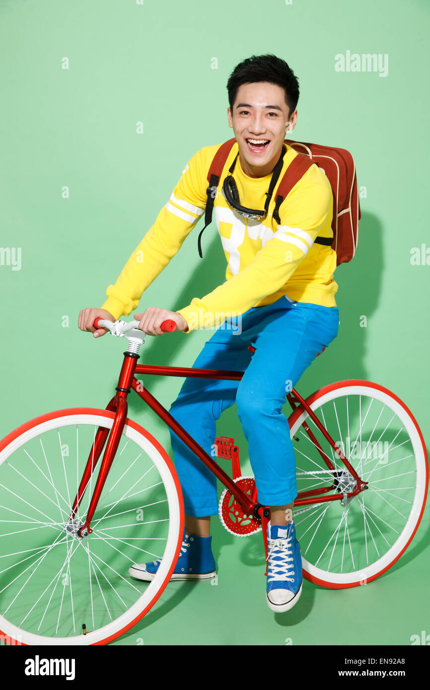 Indian man riding bicycle hi-res stock photography and images - Alamy