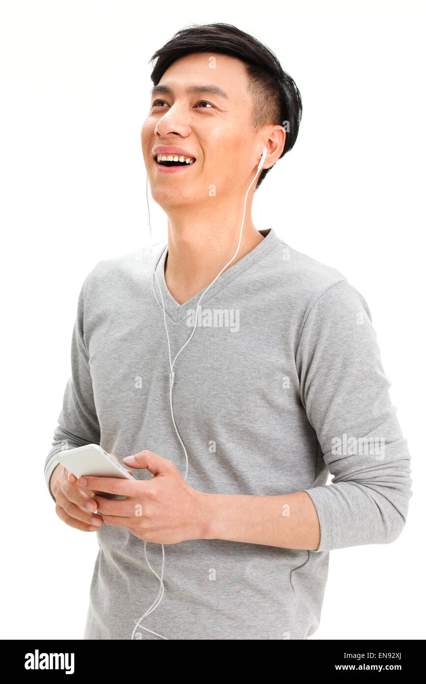 Handsome young man to listen to music Stock Photo - Alamy