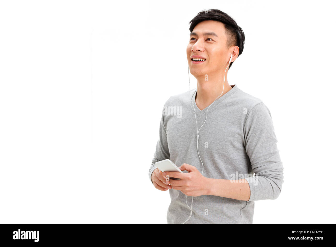 Handsome young man to listen to music Stock Photo - Alamy