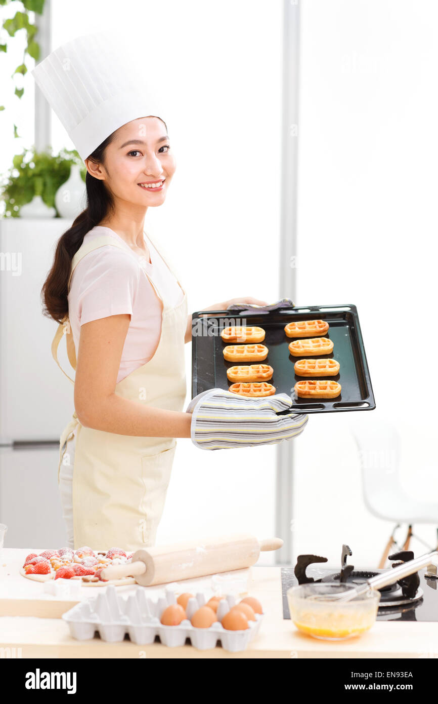 Woman baking at home Stock Photo - Alamy