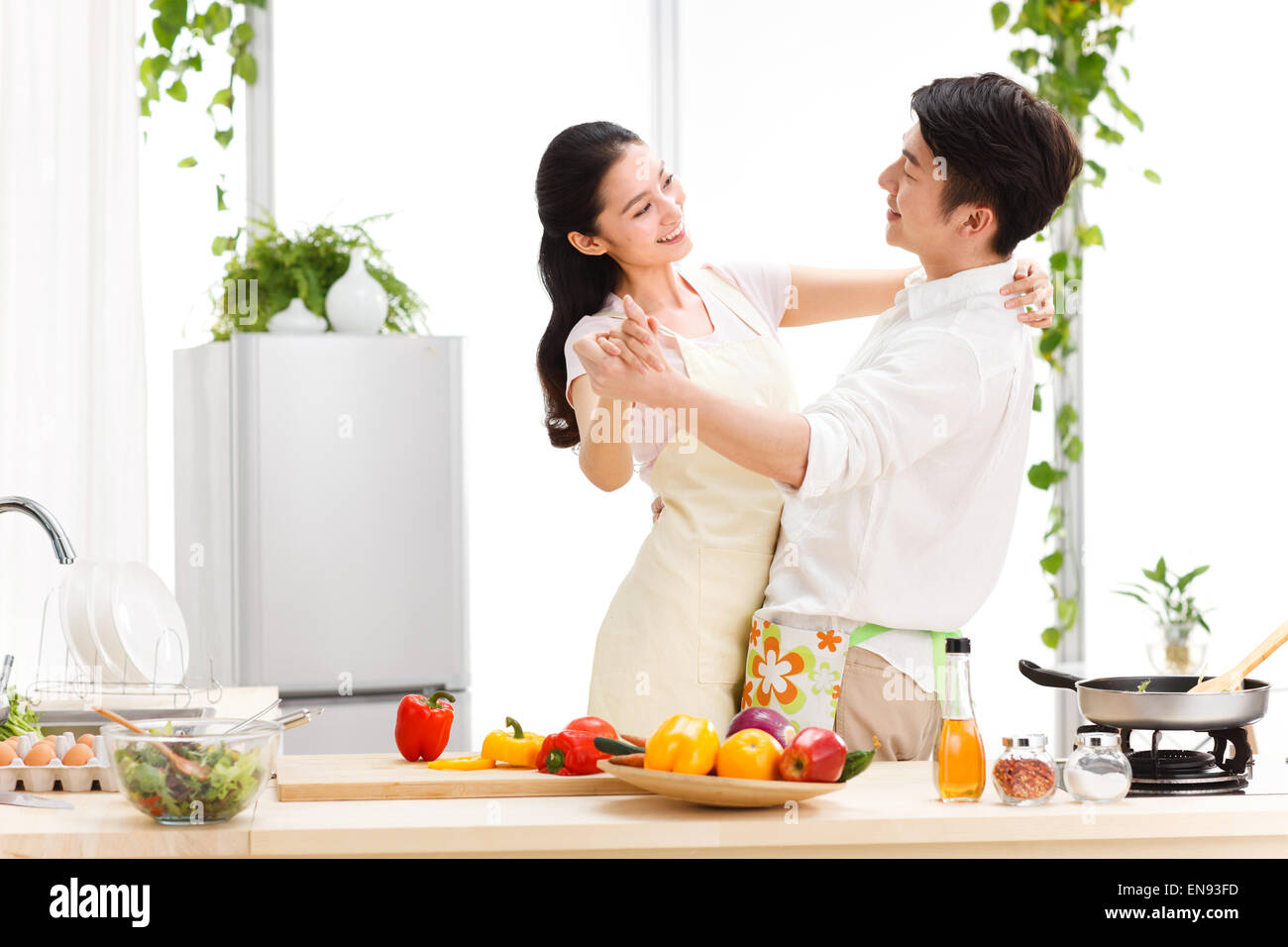 Couple cooking dancing in kitchen hi-res stock photography and images ...