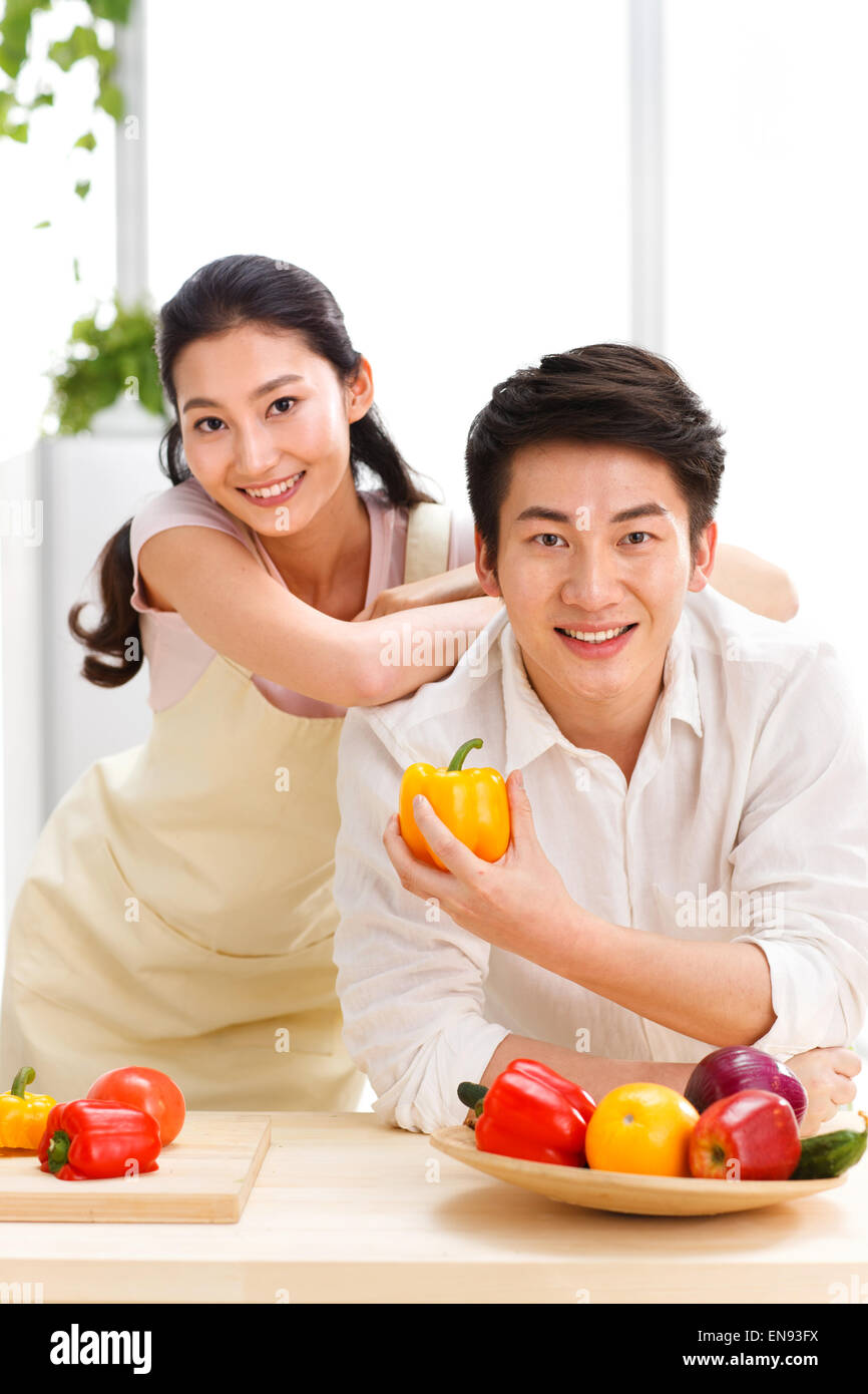 Indian young couple in kitchen at home hi-res stock photography and ...