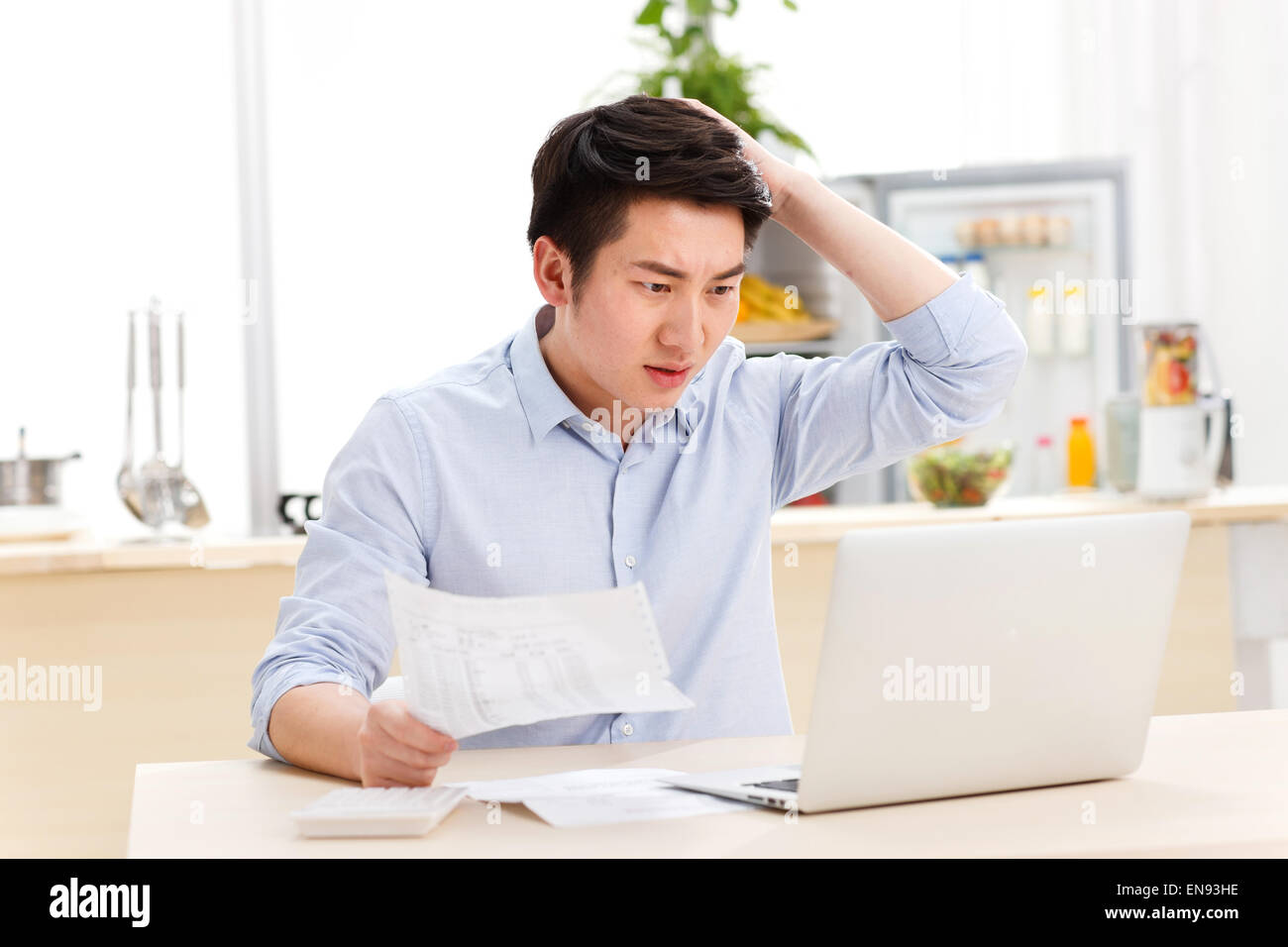 Man using calculator table hi-res stock photography and images - Alamy