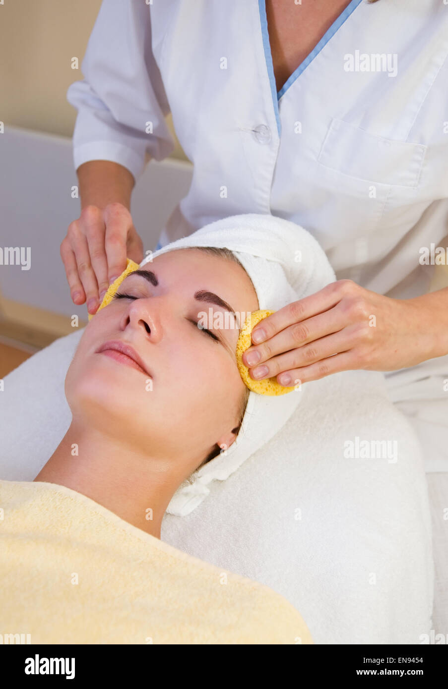 Beautiful girl in spa salon Stock Photo - Alamy