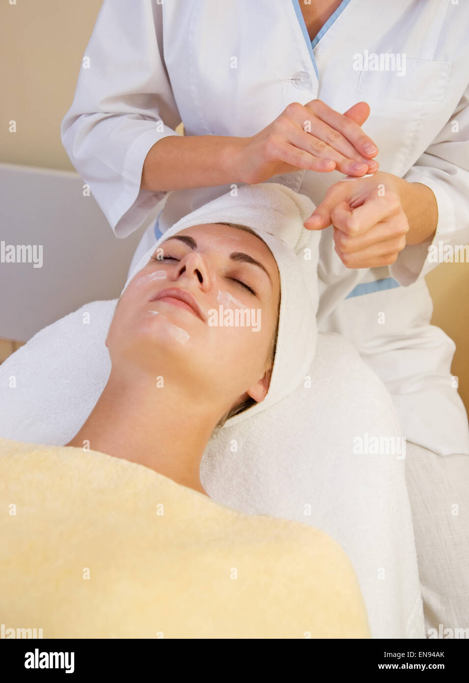 Beautiful girl in spa salon Stock Photo - Alamy