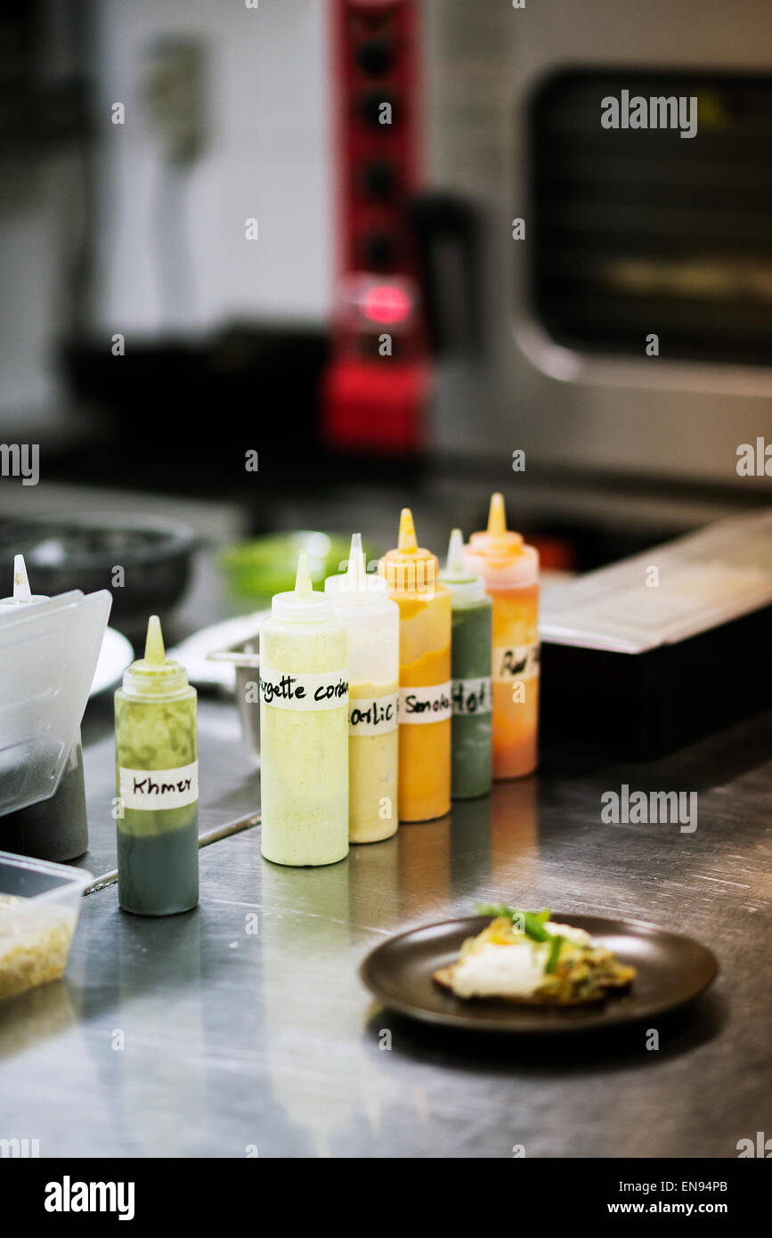 mixed sauces in modern kitchen interior Stock Photo - Alamy