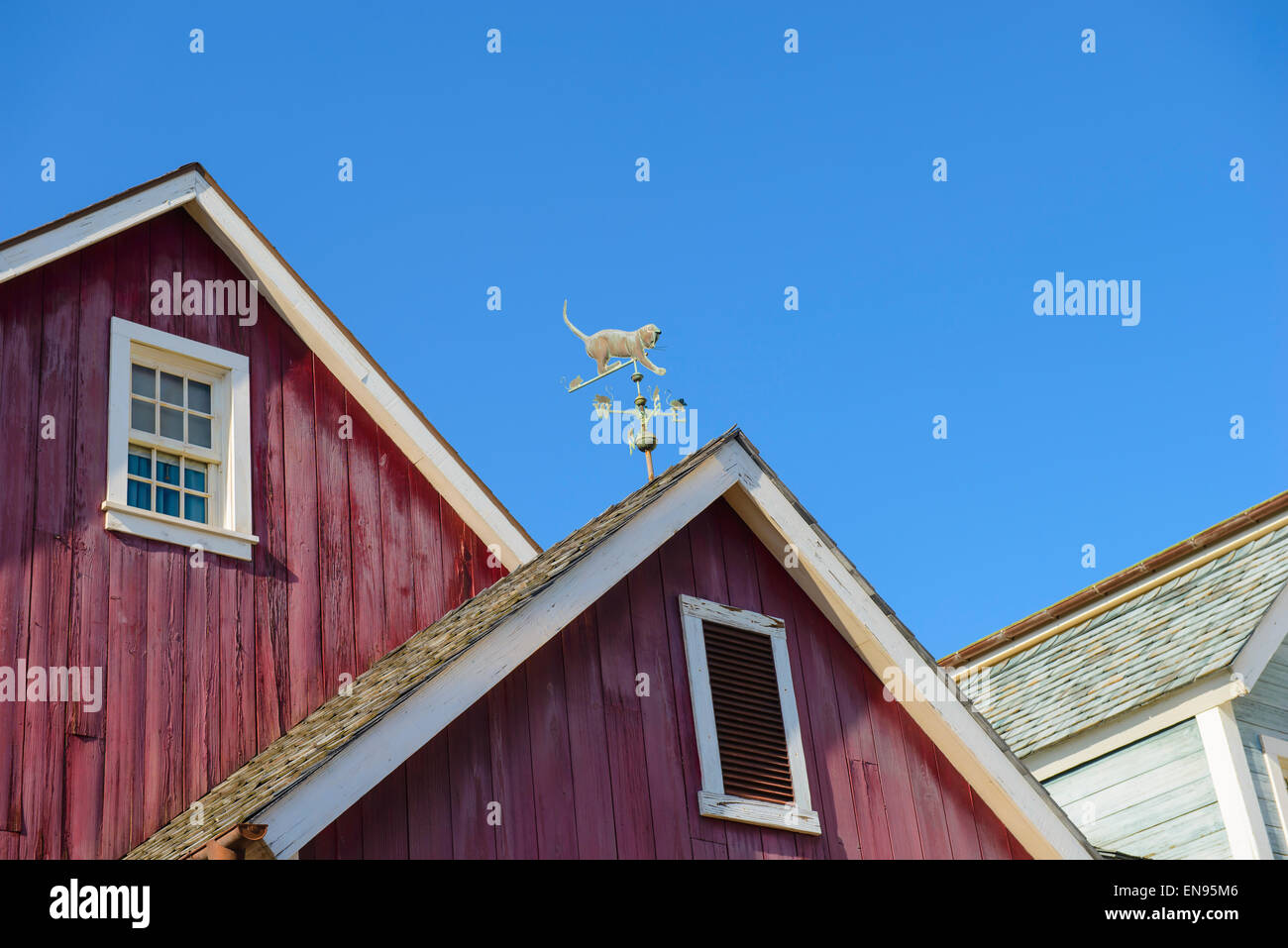 Weather vane on a roof Stock Photo - Alamy
