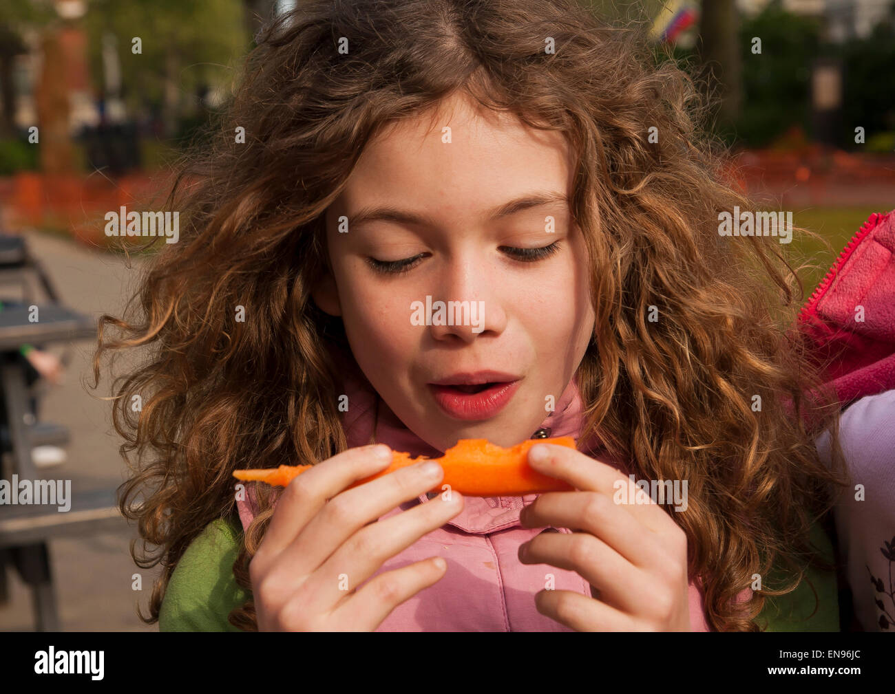 young child eating a fresh carrot Stock Photo - Alamy