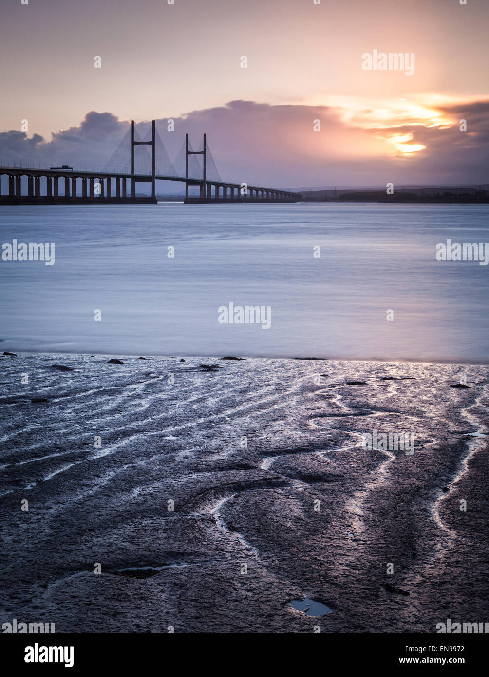 Sunset over the M4 Severn Road Bridge, spanning the Severn Estuary ...