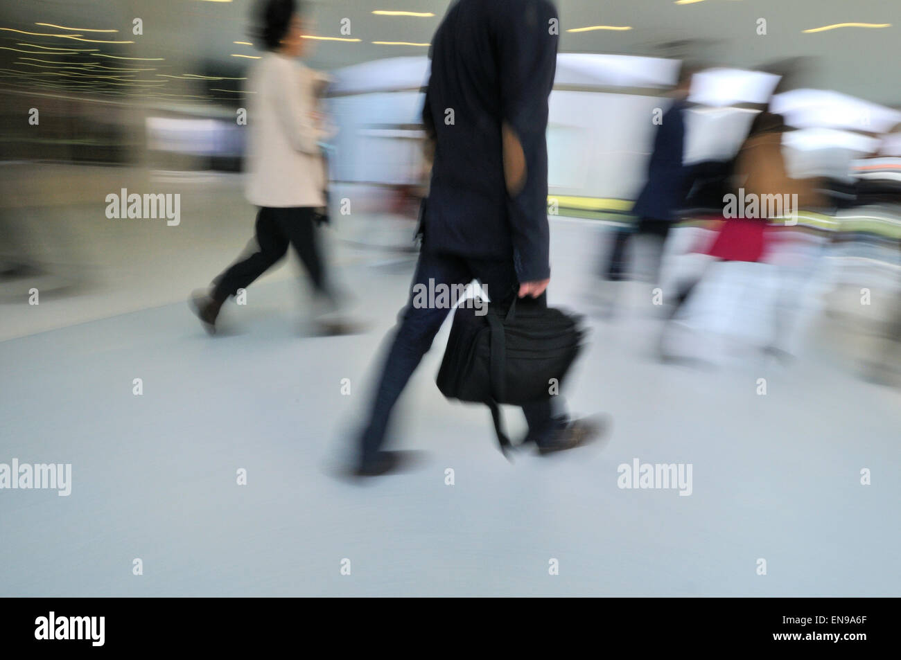 Business people in movement Stock Photo - Alamy