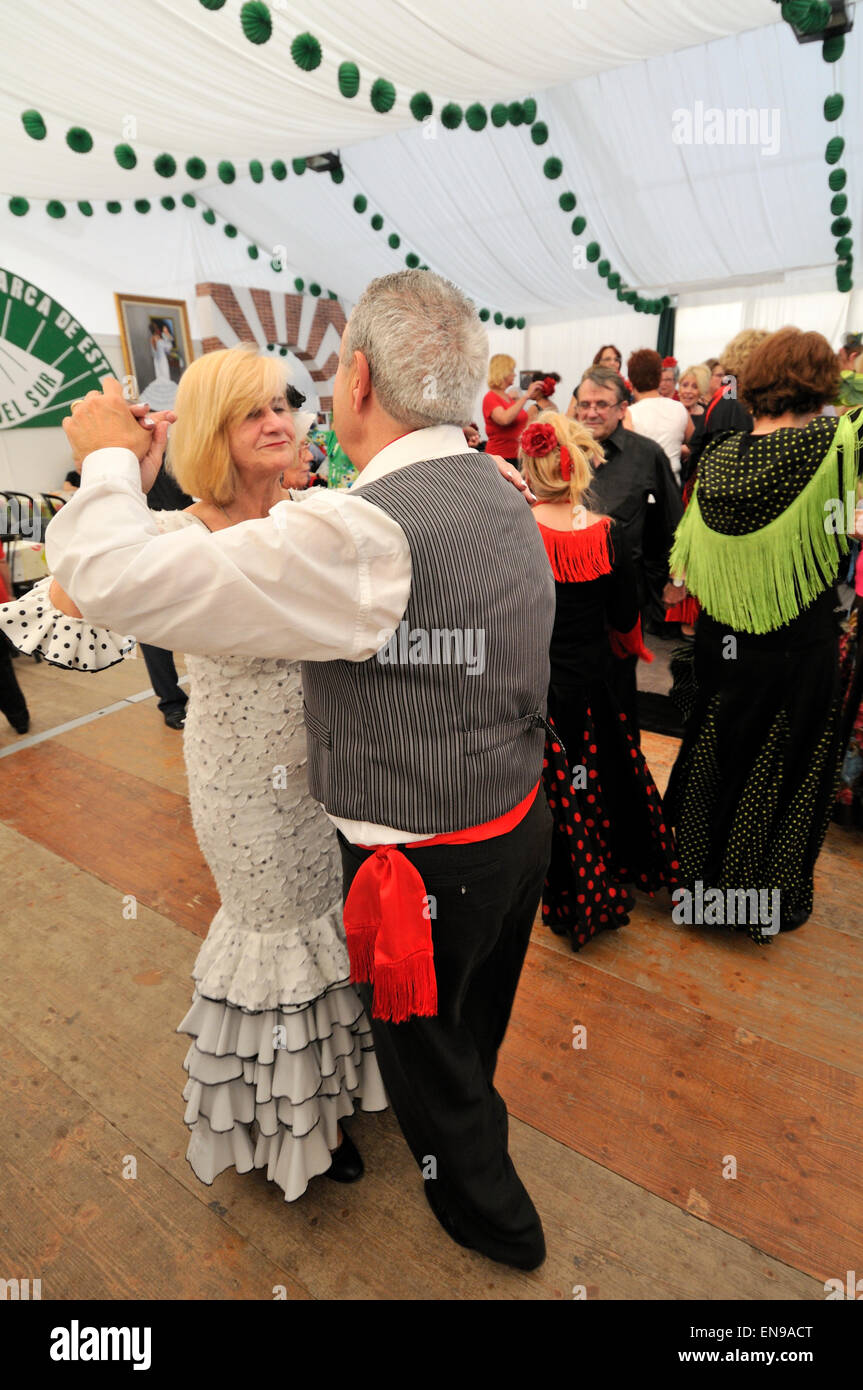 Couple dancing at April Fair Stock Photo - Alamy