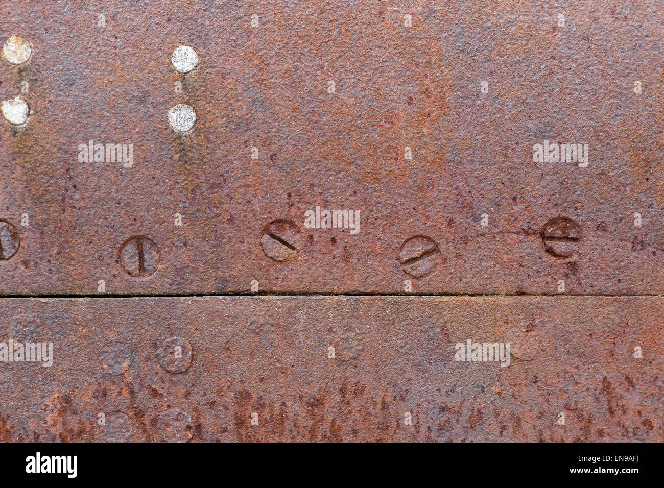 Rusty rough metal surface with bolts. Abstract grunge texture Stock ...