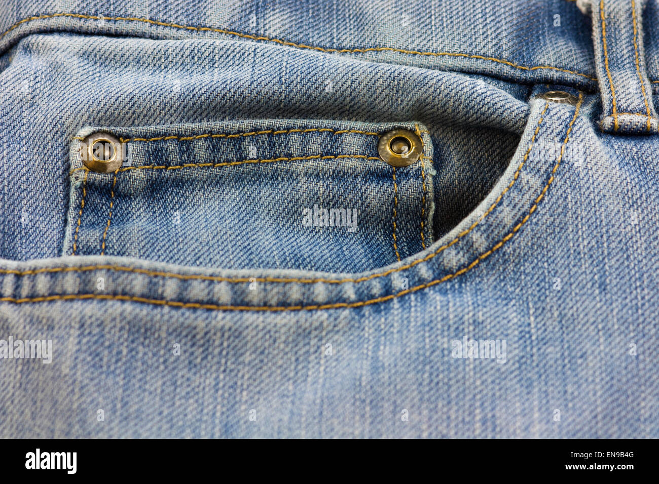 Blue Denim jeans pocket close-up Stock Photo - Alamy