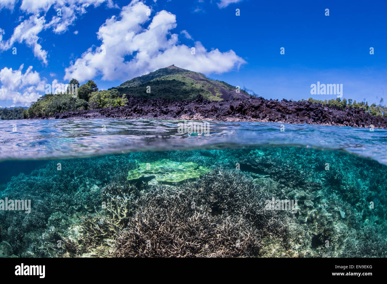 An over under shot showing the active volcano of Banda and the fast ...