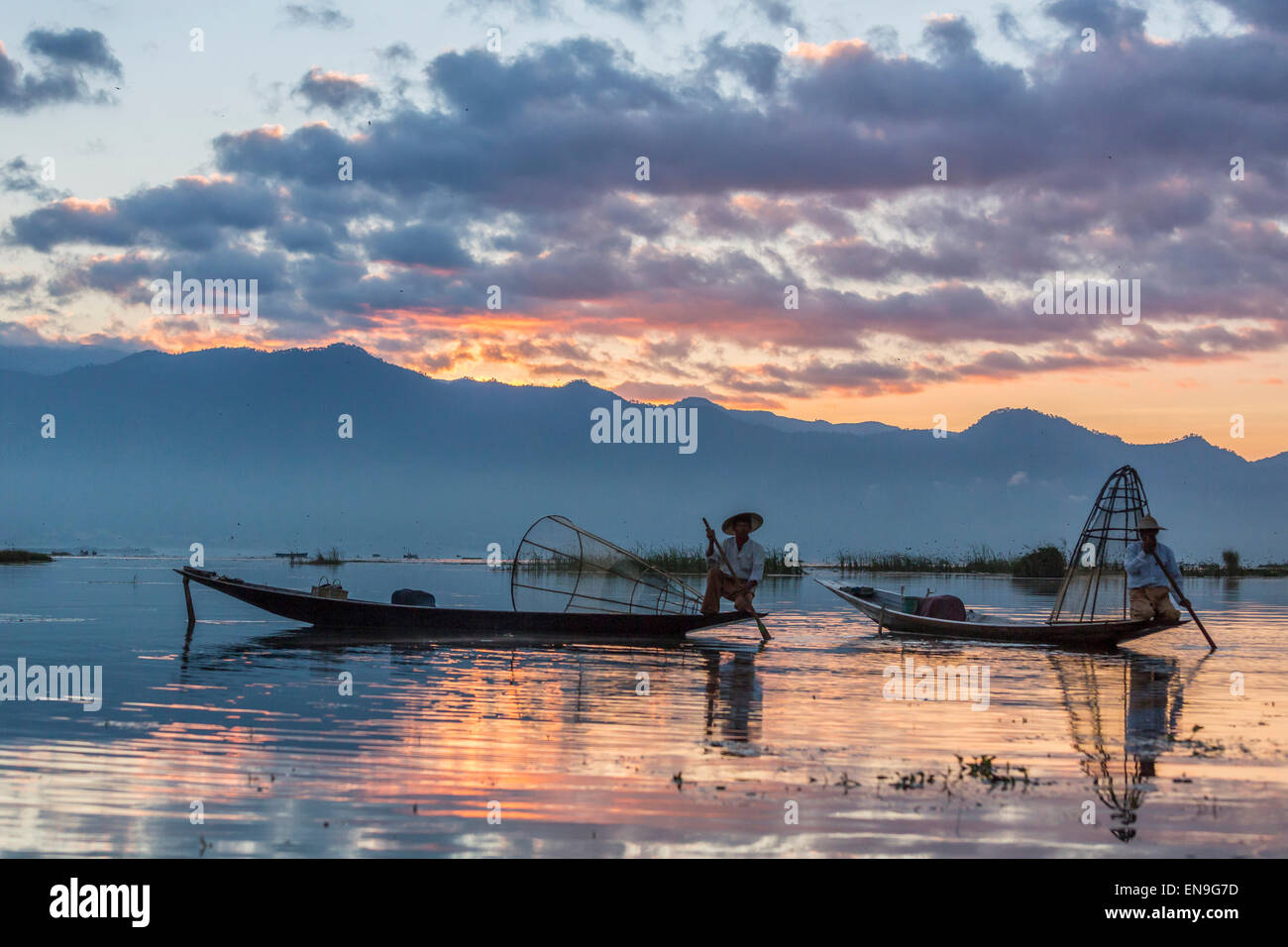 Fisherman on Inle Lake fishing, Myanmar Stock Photo - Alamy