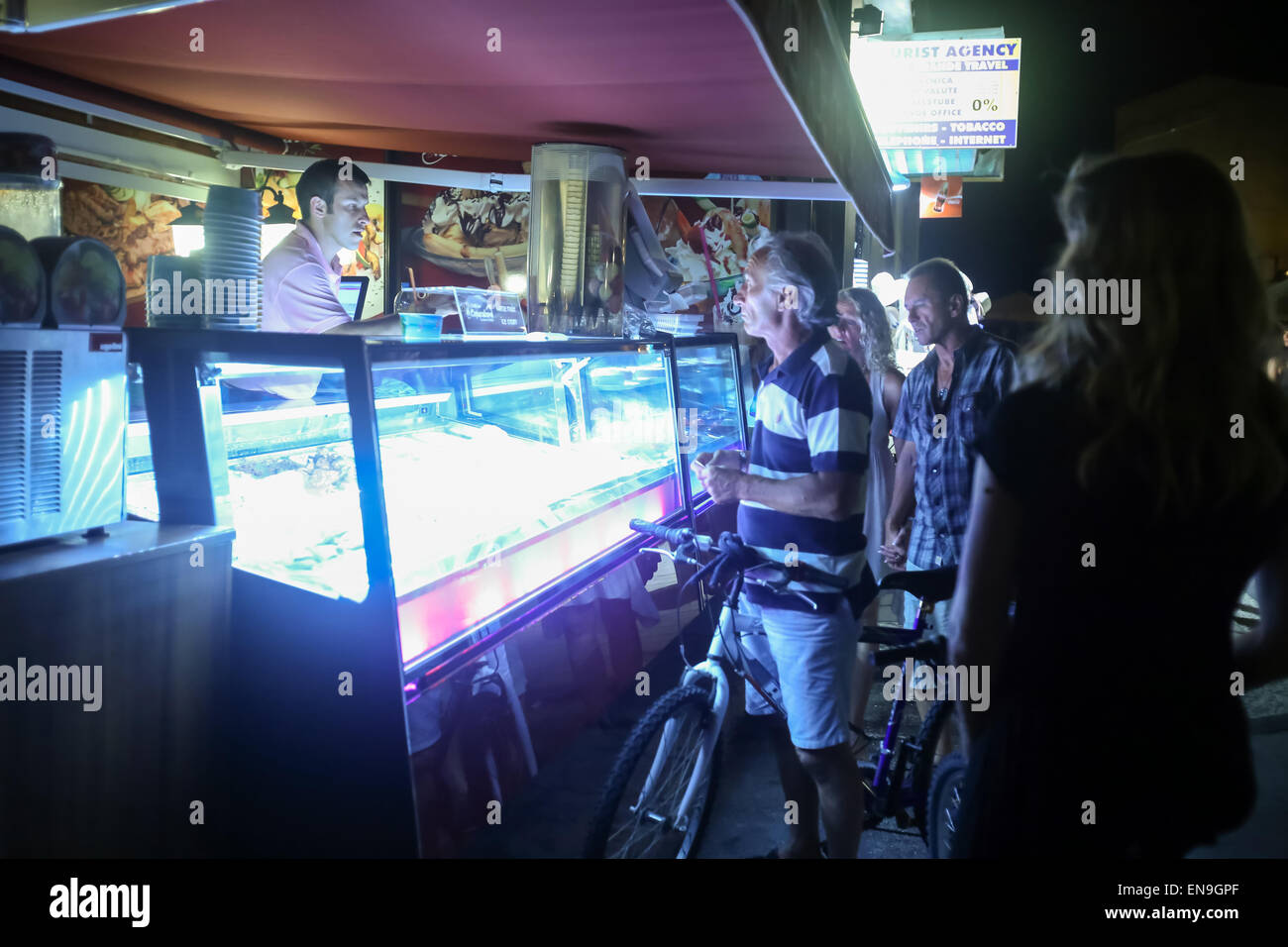 People standing in the line and waiting to buy ice cream on the ...