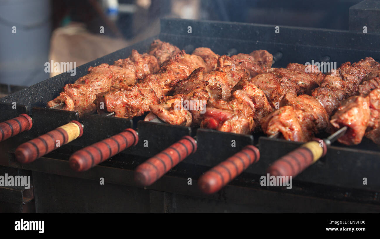 juicy delicious Grilled meat steaming on barbecue Stock Photo - Alamy