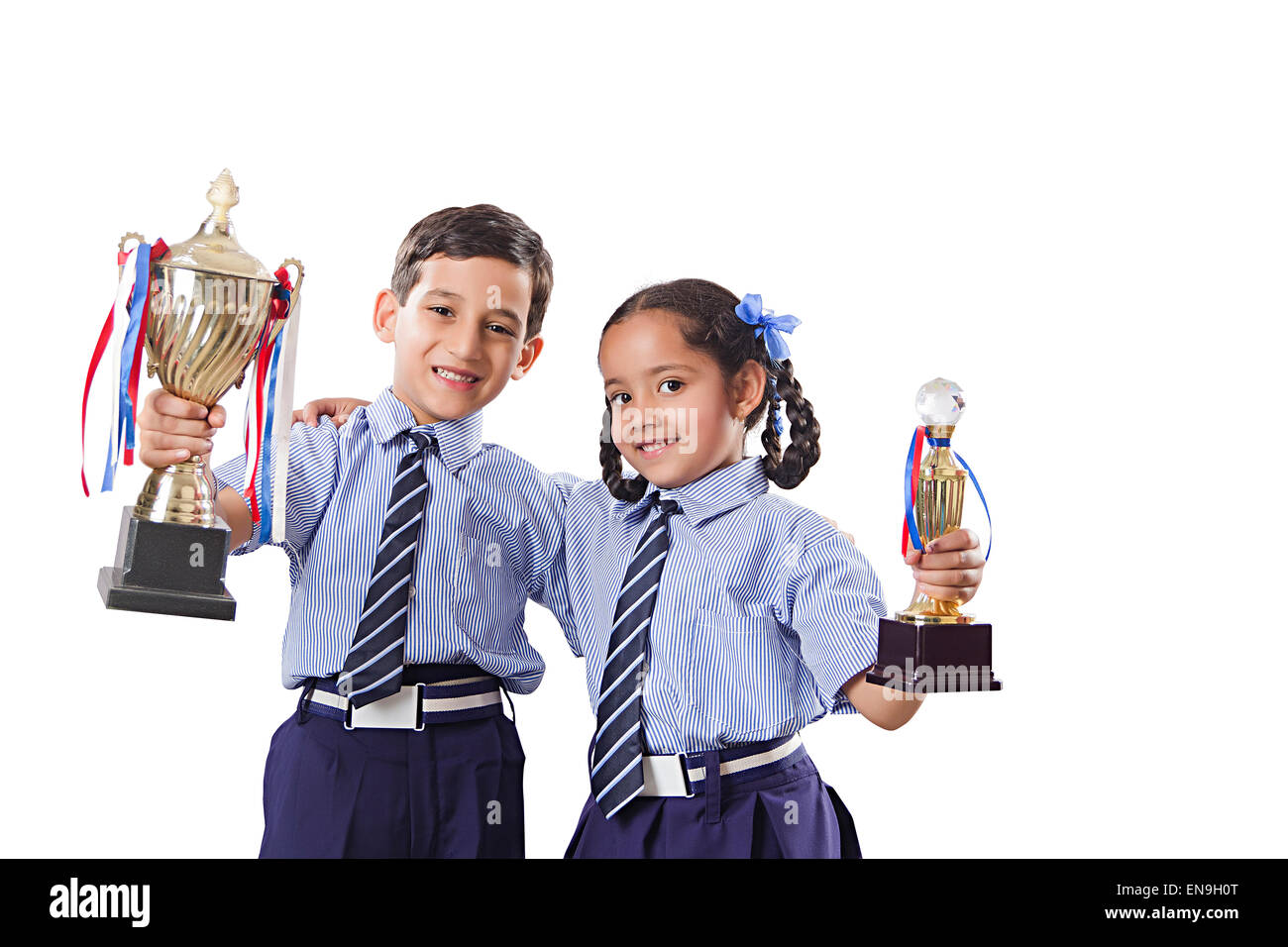 2 indian kids friends School Student Victory Trophy Stock Photo - Alamy