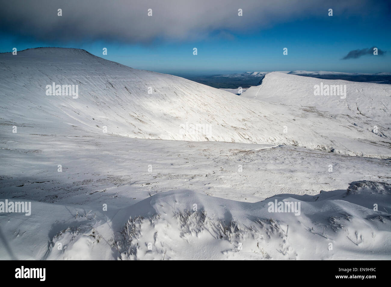 Stunning landscape views from top of deep snow covered mountains in ...