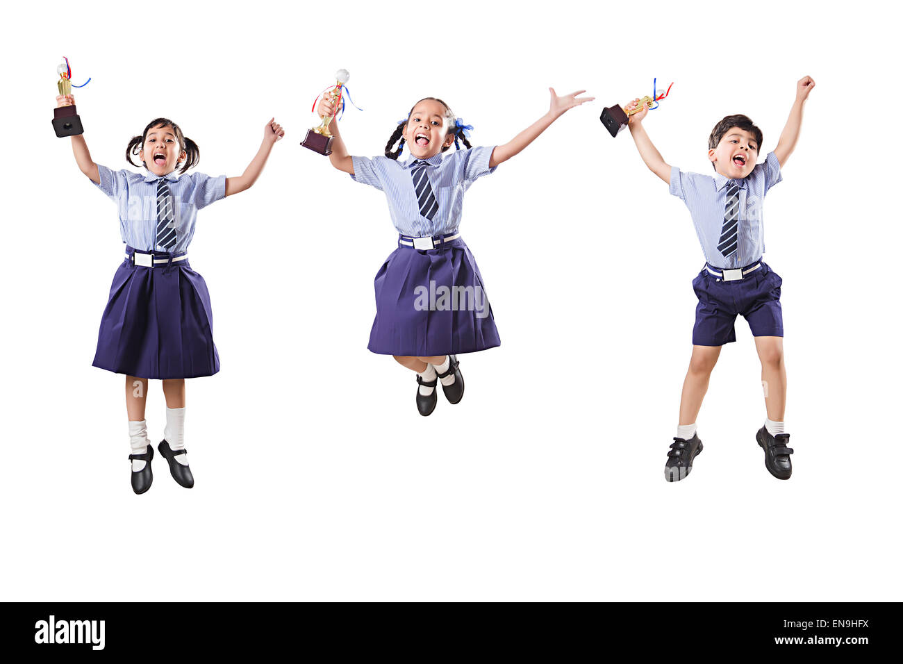 Kids holding trophy Cut Out Stock Images & Pictures - Alamy