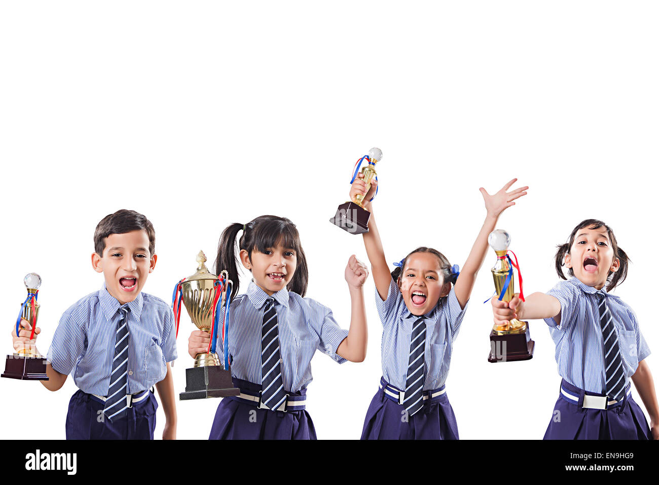 4 indian kids friends School Student Victory Trophy Stock Photo - Alamy