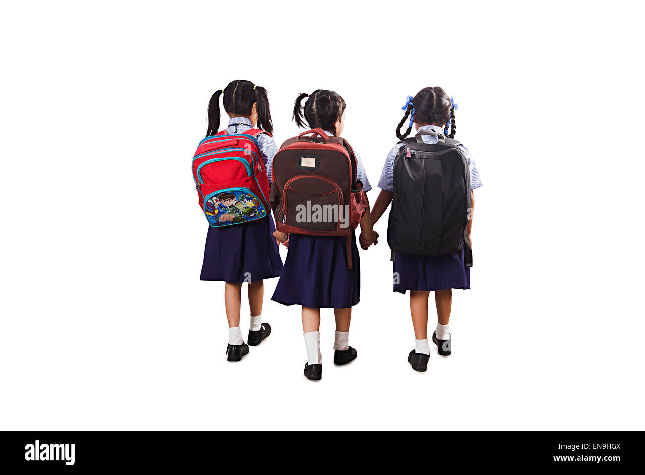 Indian school girls walking back hi-res stock photography and images ...