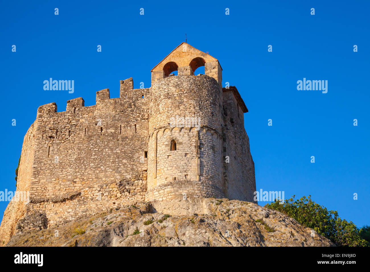 Medieval stone castle on the rock in Spain. Main landmark of Calafell ...