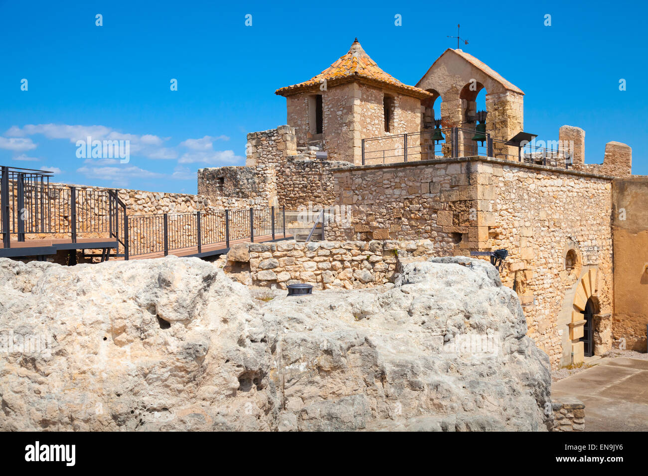 Small medieval stone castle on the rock in ancient Calafell town, Spain ...