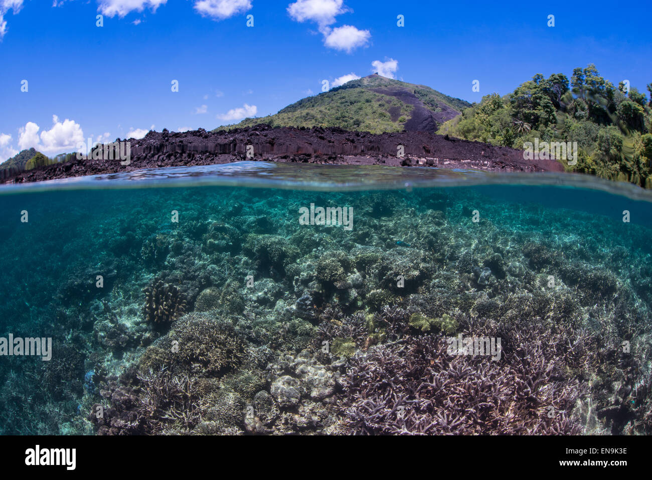 An over under shot showing the active volcano of Banda and the fast ...